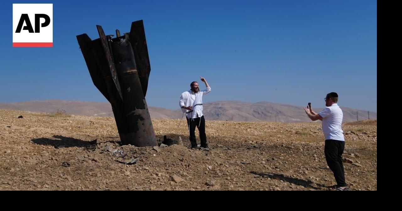 Missile fragment lands in West Bank after wave of projectiles launched ...