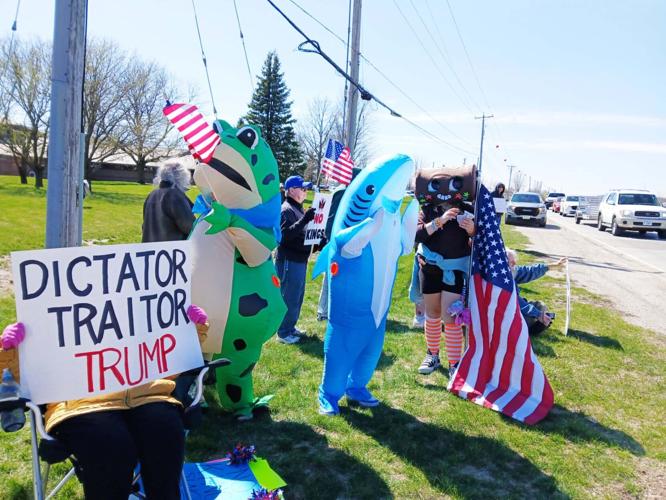 Signs, costumes and cheers mark ‘No Kings’ rally | The Hawk Eye ...