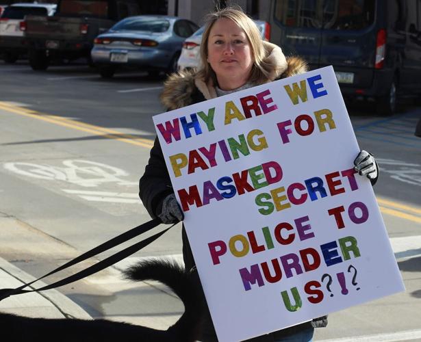 Local demonstrators protest Minneapolis ICE shooting | The Hawk Eye ...