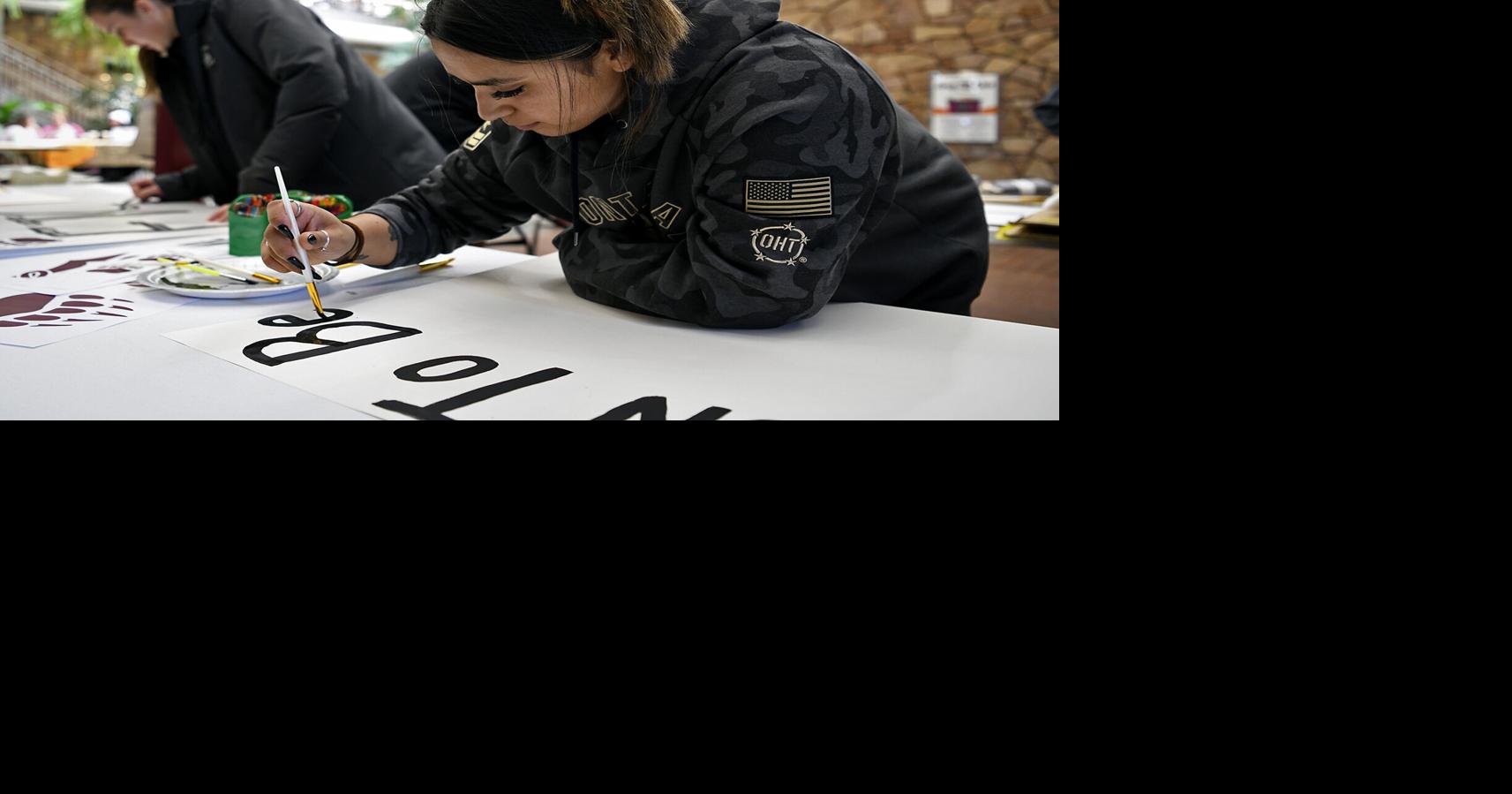 Photo: UM Students Make Signs for Griz-Cat Game