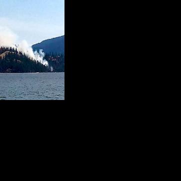 Boats ferry crews, helicopters douse fire on Wild Horse Island