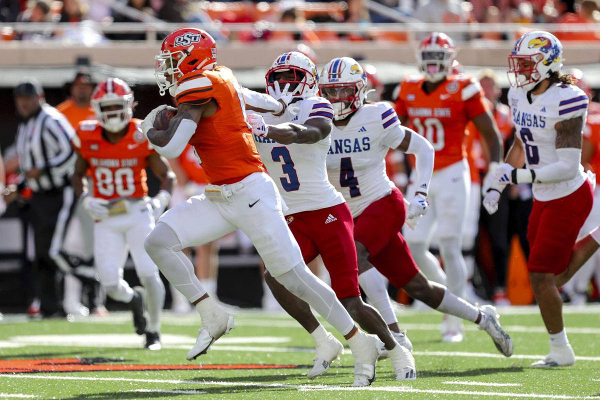 Gordon carries Oklahoma St. to upset of No. 23 Kansas