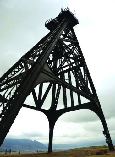 Stormy skies, Butte headframe create stunning view