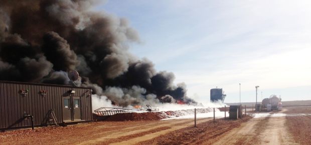 Explosion, fire destroy 13 storage tanks at saltwater disposal site