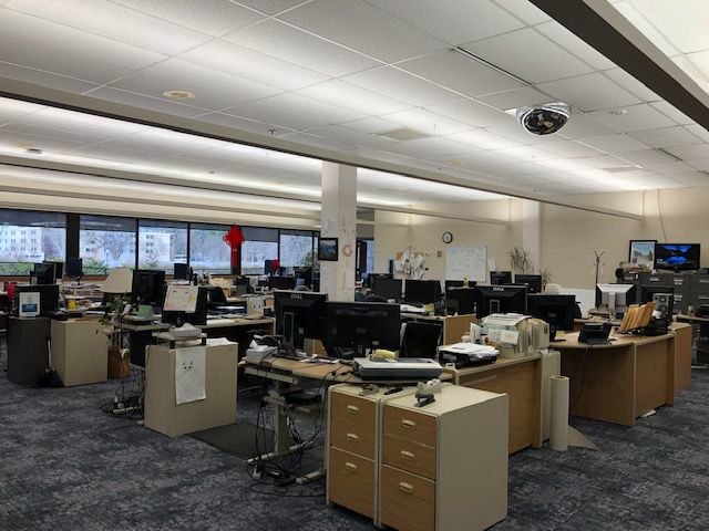 Empty newsroom, full newspaper, overflowing hearts