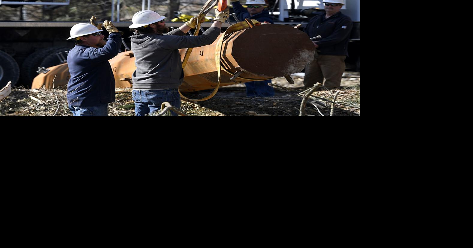 NorthWestern Energy installs new power poles
