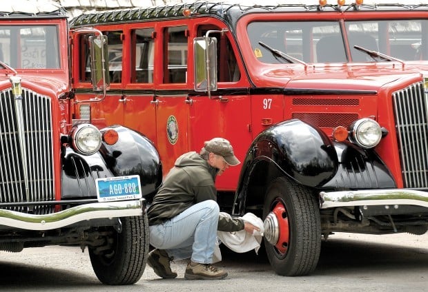 ‘Reds’ get ready: Workers prepare fleet of buses for season on the road