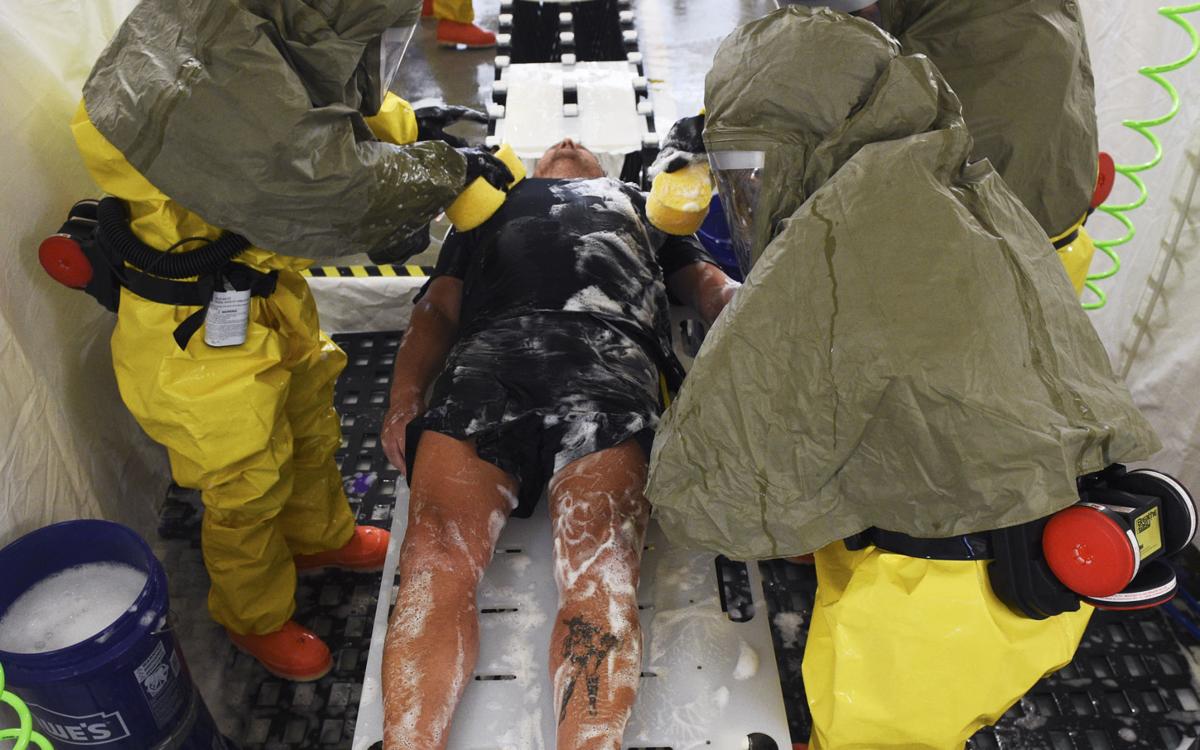 Volunteers role-play victims in hospital decontamination drill | Local ...