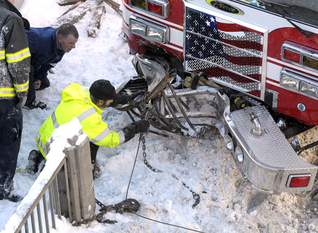 City firetruck crowded by traffic, crashes on Orange Street