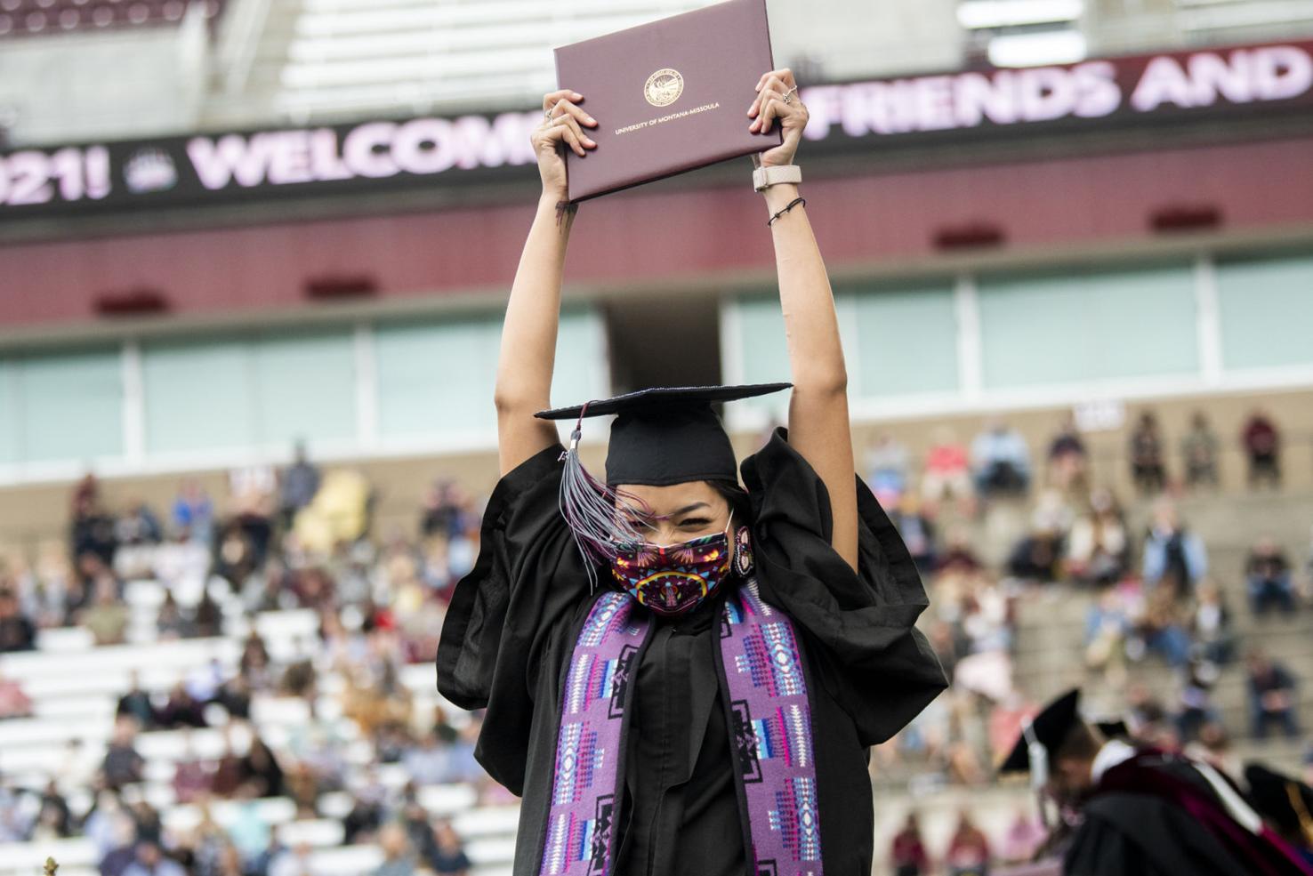 Graduates don caps, gowns and masks at UM commencement
