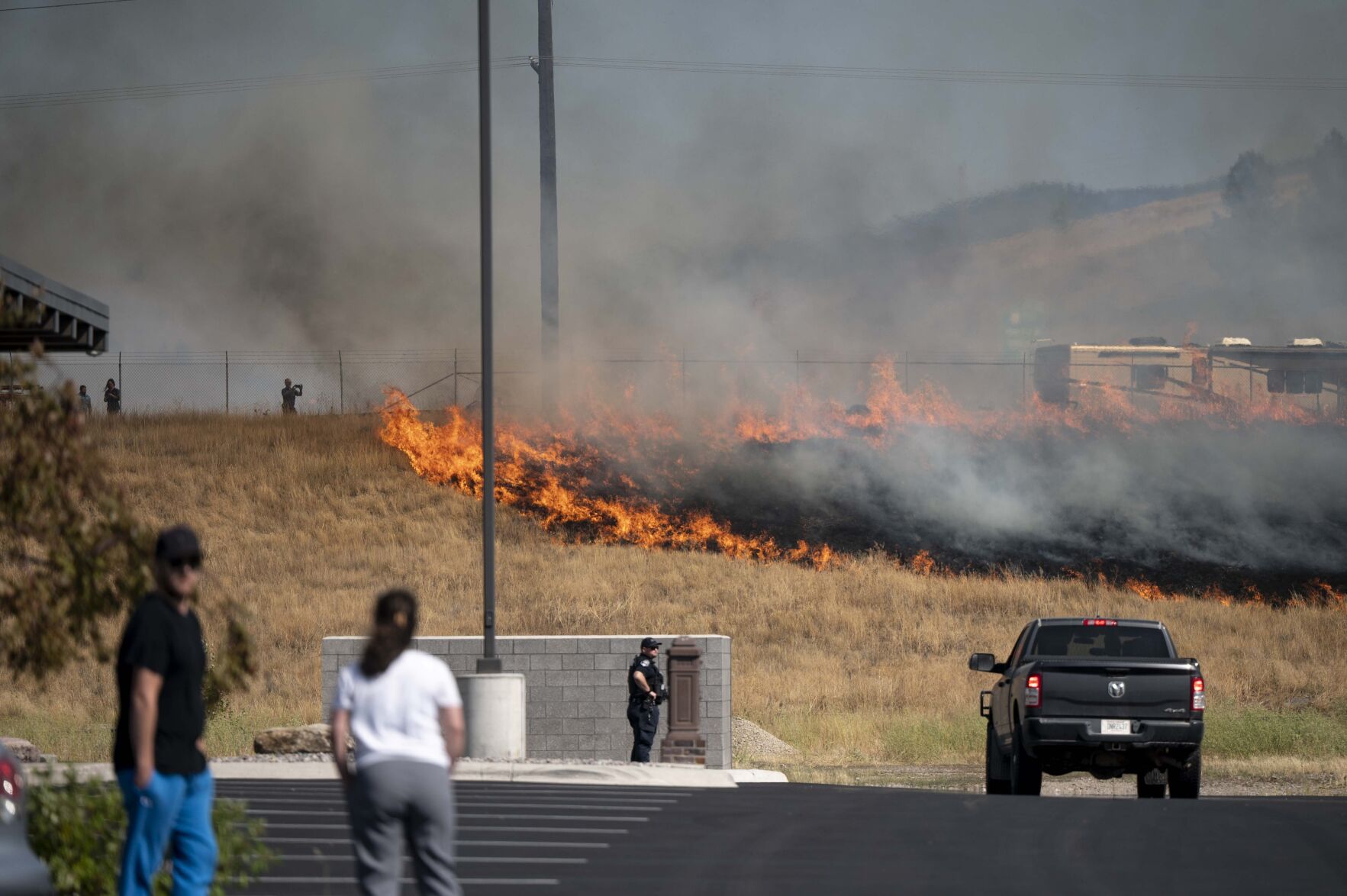 Large grass fire burning near Missoula's Reserve Street