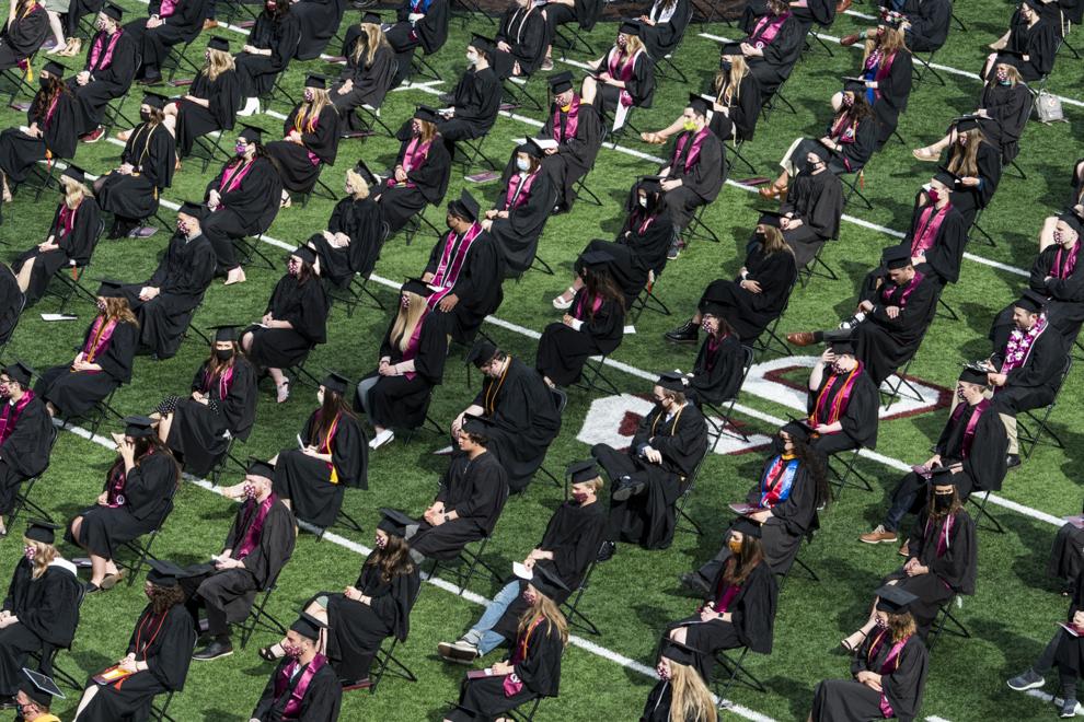 Graduates don caps, gowns and masks at UM commencement