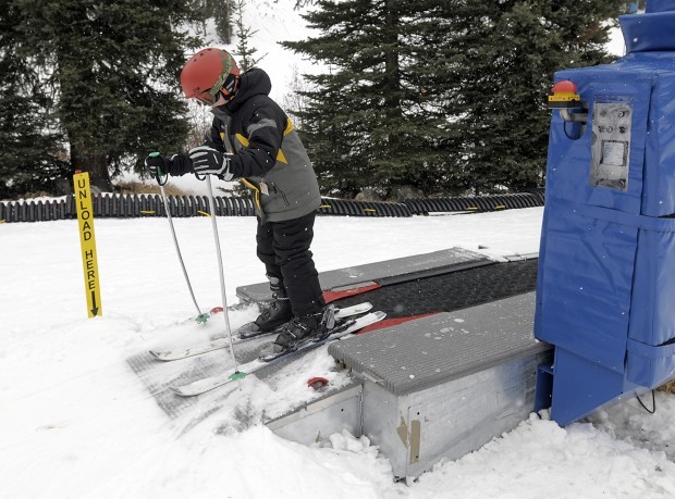 The snow belt: Conveyor at Discovery Ski Area carries beginners up mountain