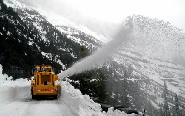 Slow going as crews work to clear snow on Sun Road