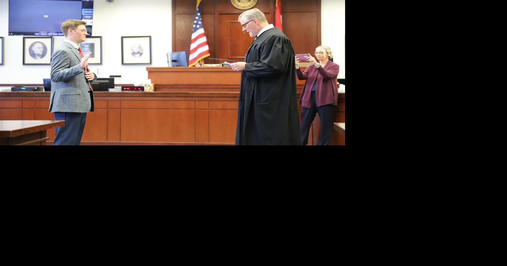 Paternal precedent: Judge Hellmann swears in son to Missouri bar ...