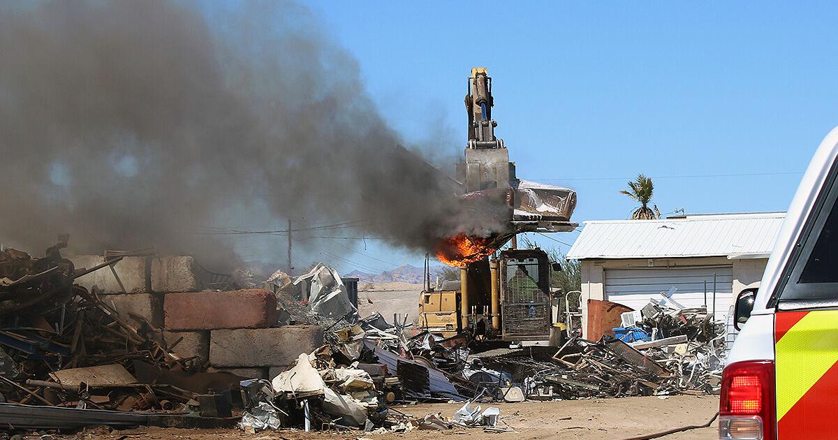 Punctured refrigerant compartment sets metal scrap pile on fire in ...