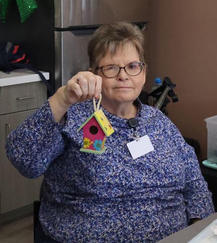 Photos: Seniors turn plain birdhouses into floral works of art | News ...