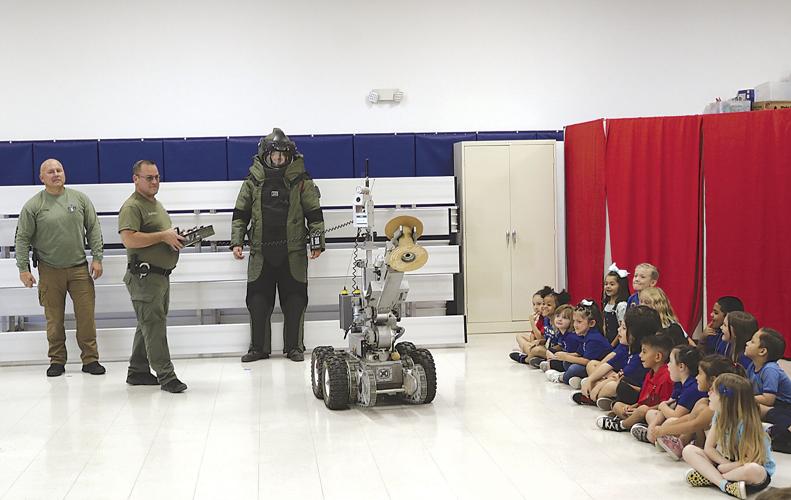 Elementary school students get close look at bomb squad tech | News ...