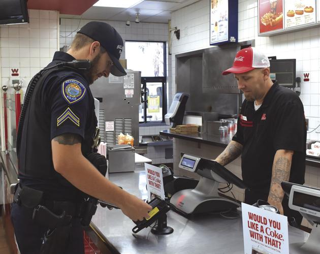 To serve, protect and stay clean: Police observe National Hot Dog Day ...