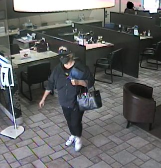 Police release surveillance photos of Foothills Bank robbery suspect ...