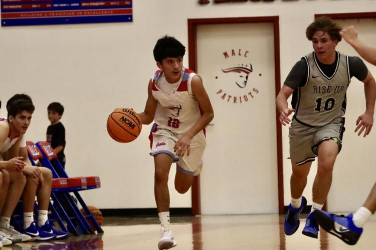 Photos: MALC boys basketball vs North Valley Christian Academy, Jan. 15 ...