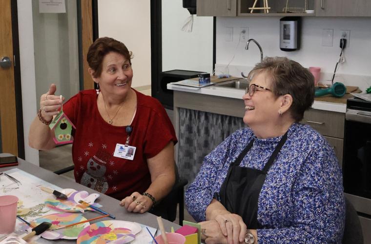 Photos: Seniors turn plain birdhouses into floral works of art | News ...