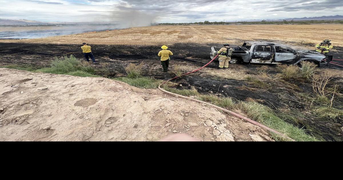 Law enforcement vehicle fire sparks field fire | News | mohavedailynews.com