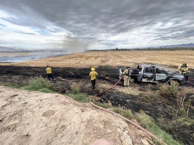 Law enforcement vehicle fire sparks field fire | News | mohavedailynews.com