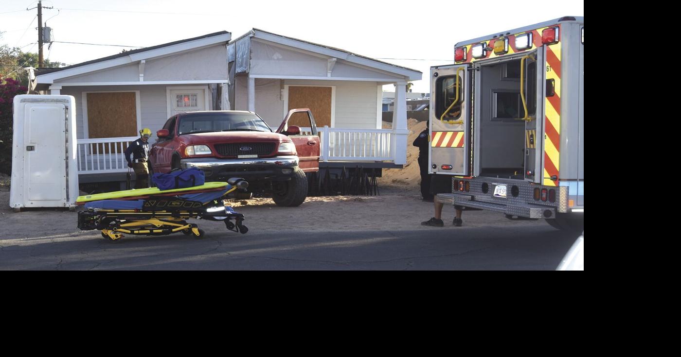 Firefighters rescue men trapped under manufactured home in Bullhead ...