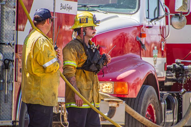 Visual story: Fire suppression continues in blaze that spread from ...