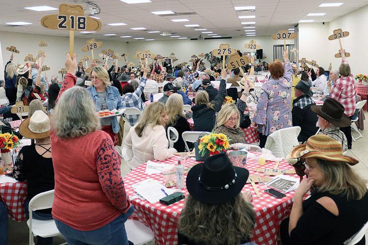 Western Auction fundraiser offered boot-stomping good time | News ...