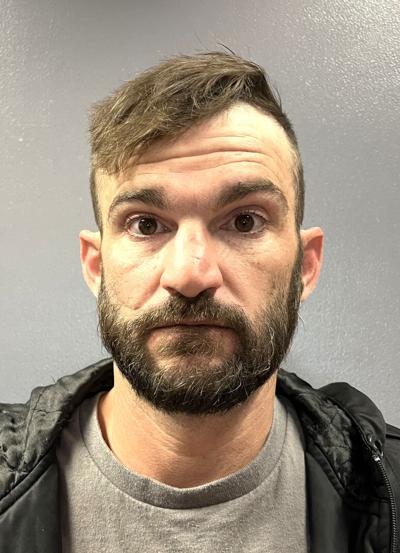 Man arrested after allegedly shooting two people outside home | Crime ...