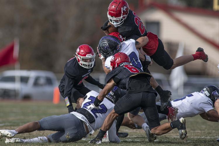 Red Hawks win 53-21, trigger mercy rule in bout against Mesa Ridge ...