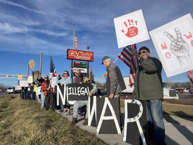 Protesting 'ICE Cold Murder' and an illegal war; Indivisible takes to ...