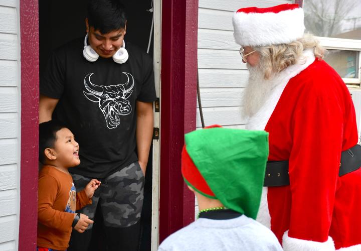 Santa, VFW members deliver Christmas joy to local children facing a ...