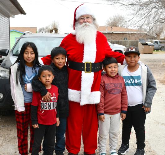 Santa, VFW members deliver Christmas joy to local children facing a ...