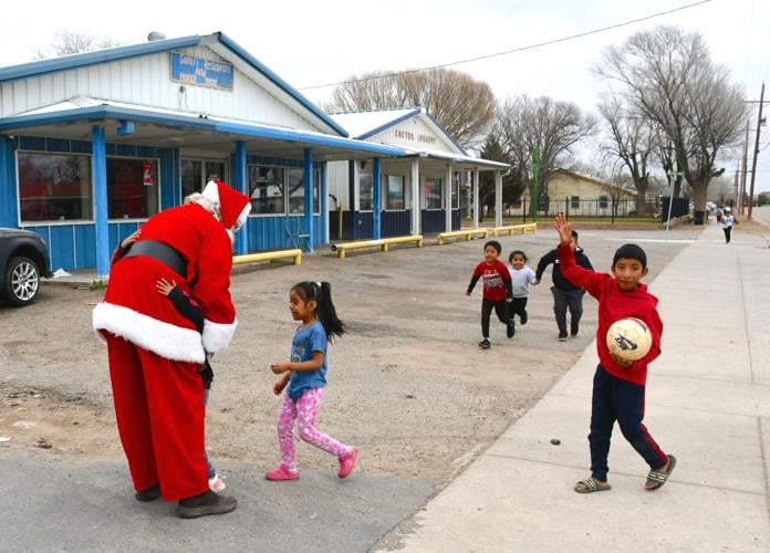 Santa, VFW members deliver Christmas joy to local children facing a ...