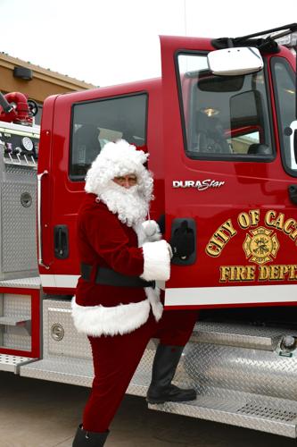 Lions, Santa Clause, firefighters deliver presents to children in need ...