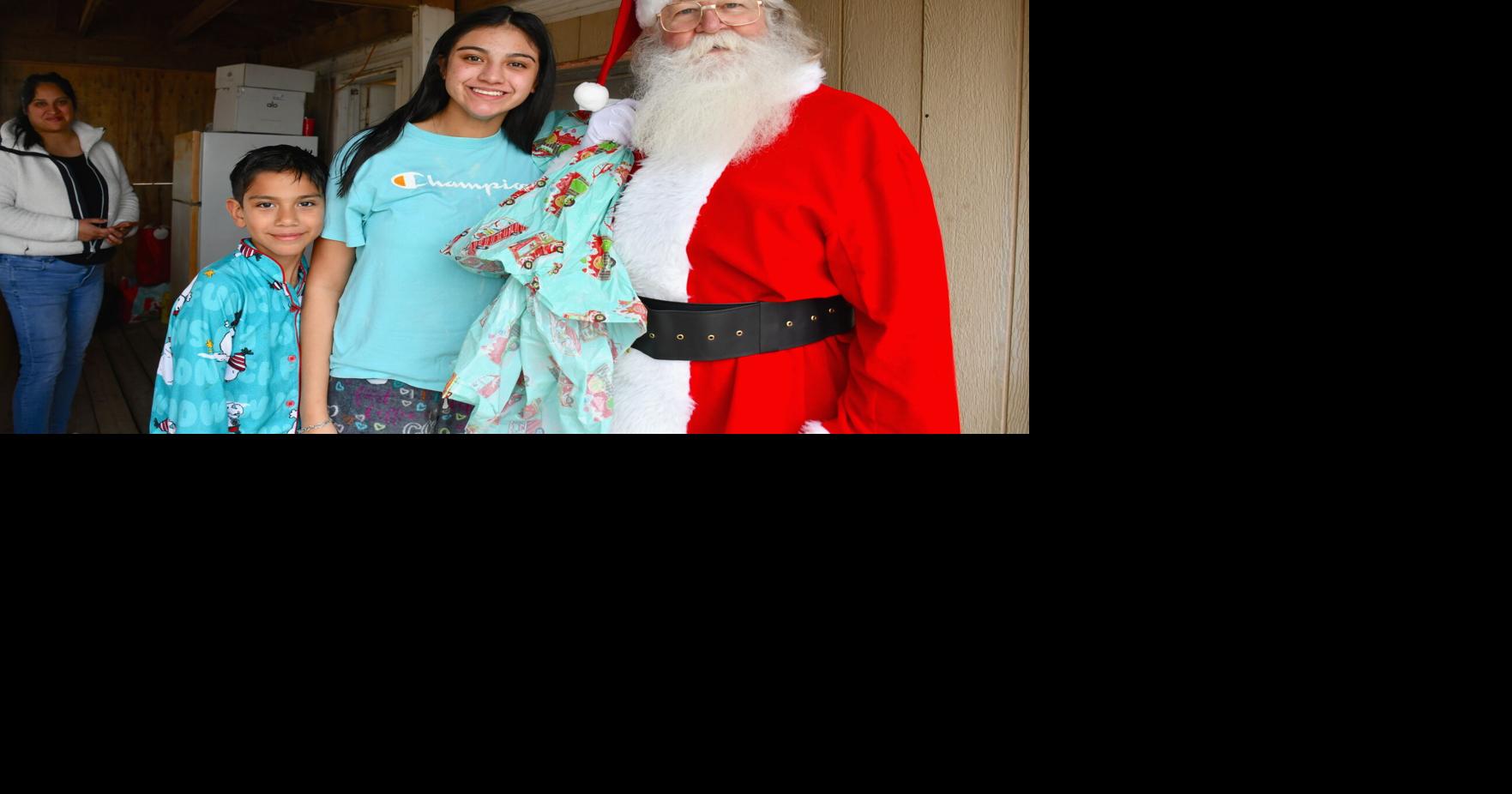 Santa, VFW members deliver Christmas joy to local children facing a ...