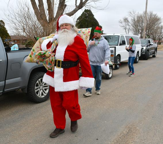 Santa, VFW members deliver Christmas joy to local children facing a ...
