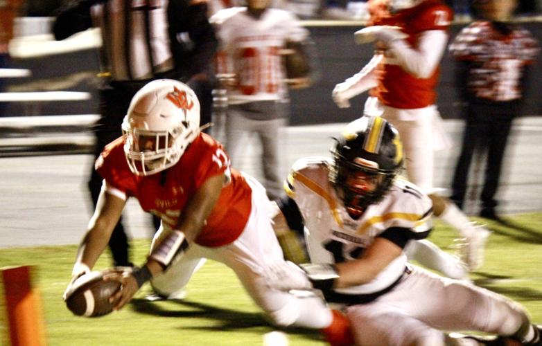 Red Devils clinch playoff spot with nail-biter win over Priceville ...