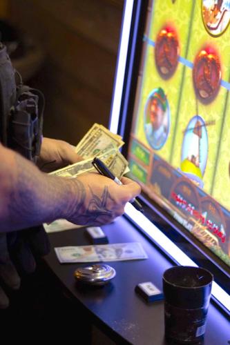 Slot machines, drugs, money confiscated; one arrest made | News ...