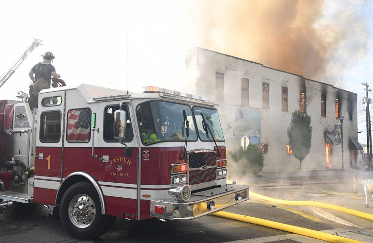Massive fire destroys downtown office building, damages others | News ...