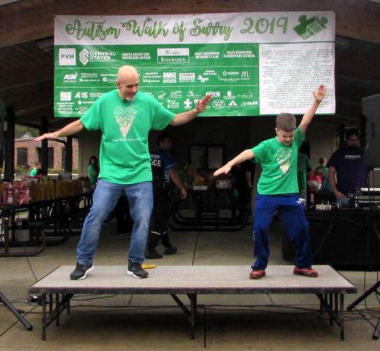 Autism Walk overcomes rain, reaches goal | Local News | mtairynews.com