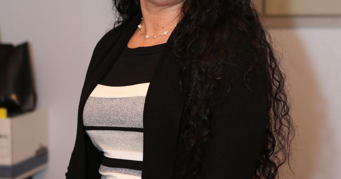 Beth Chalaire with Pony Express Tax Service delivers the digits ...