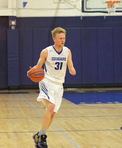 Twins captain Cougars basketball | Sports | mtdemocrat.com