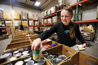 Thompson family, volunteers, community prepare for 34th annual food drive