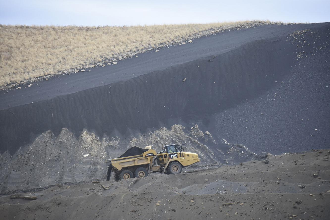 Work to cover black slag east of Anaconda resumed recently