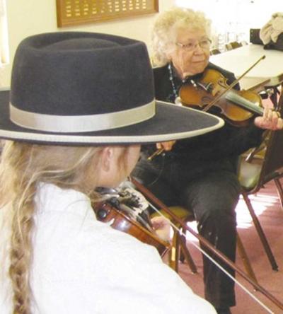 String skills - Young, old in fiddler festival