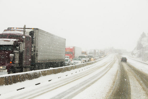 Slide-offs back up traffic over Homestake Pass